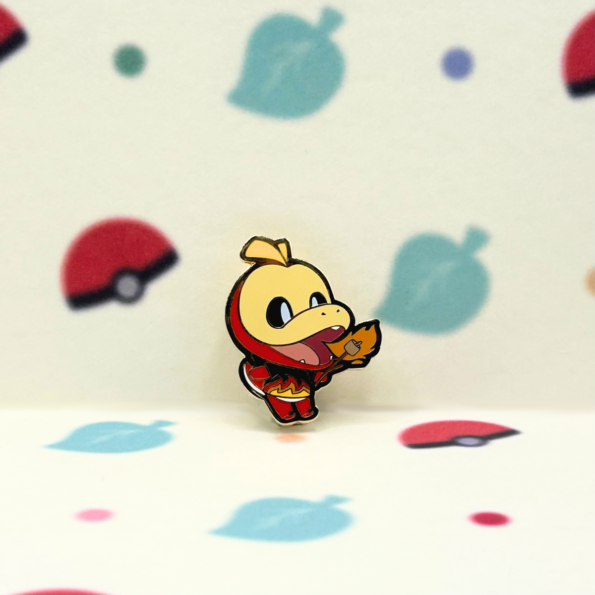 #909 Fuecoco Enamel Pin – Kyotatsu